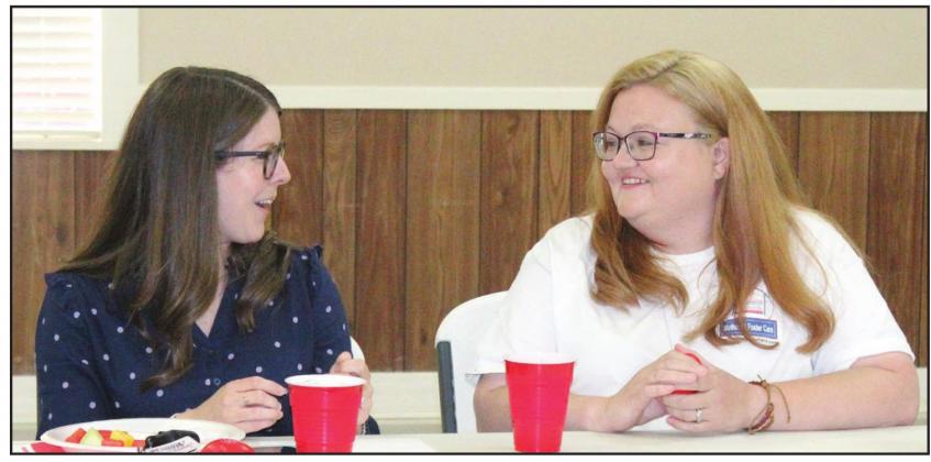 Jena native and resident Kim Corley (right) speaks with Foster Parent ...